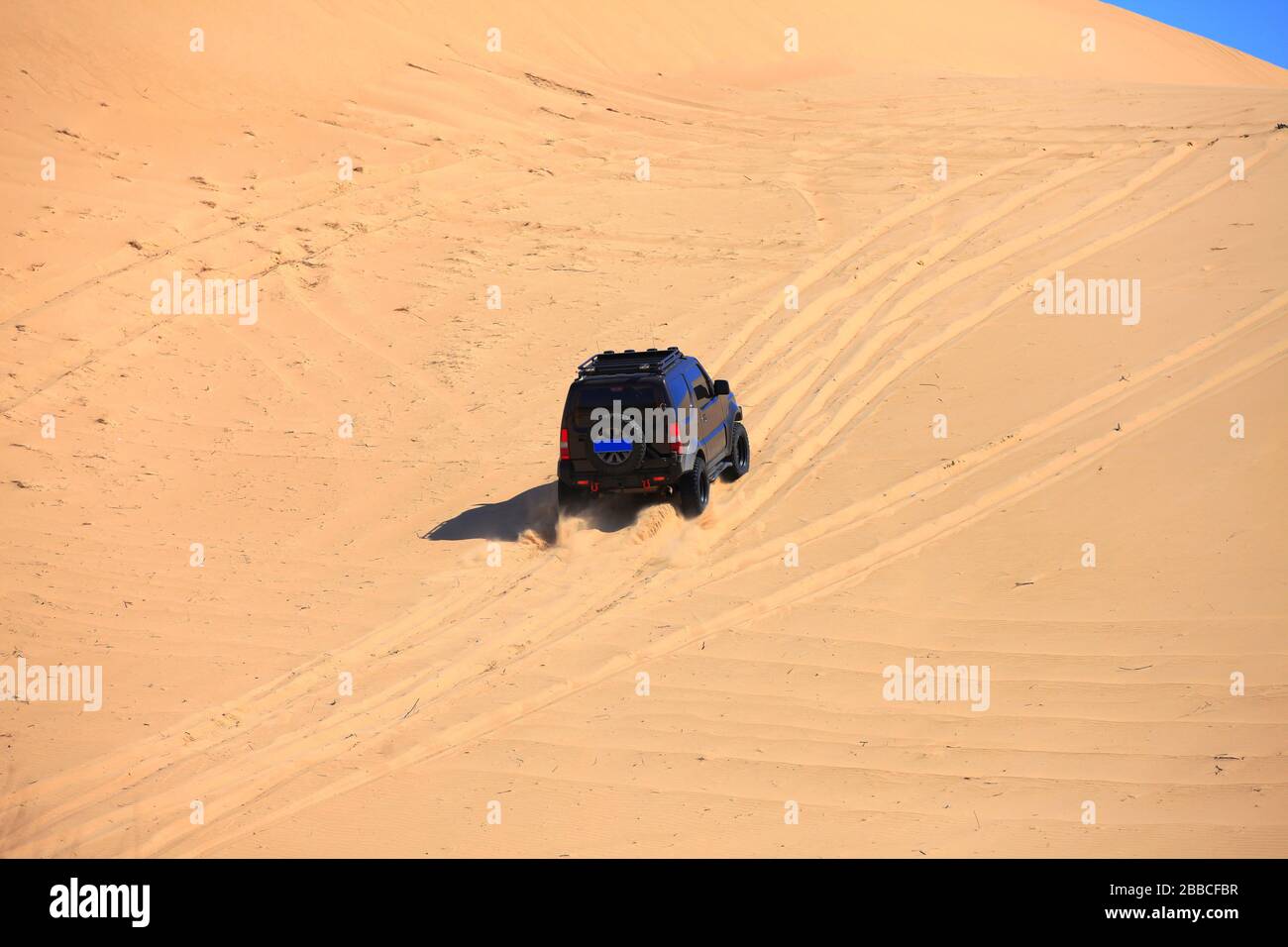 Off-road vehicle traveling in the desert, An suv was driving in the ...