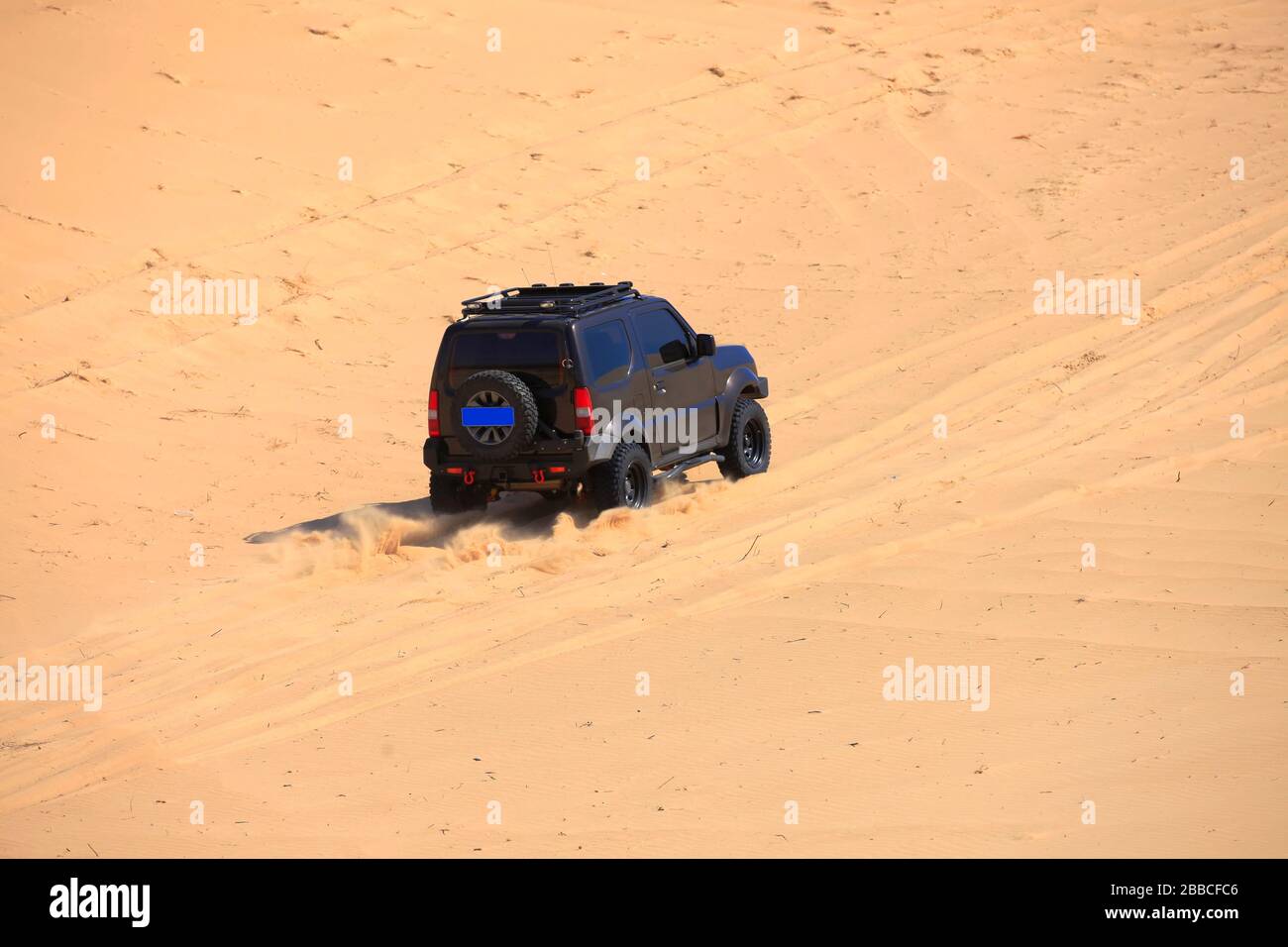 Off-road vehicle traveling in the desert, An suv was driving in the ...