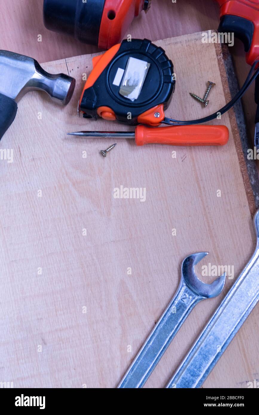set of hand working tools on wooden background The concept of tools and ...