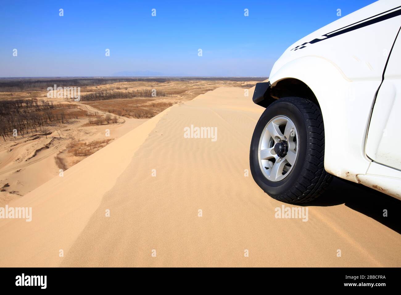 Off-road vehicle traveling in the desert, An suv was driving in the ...
