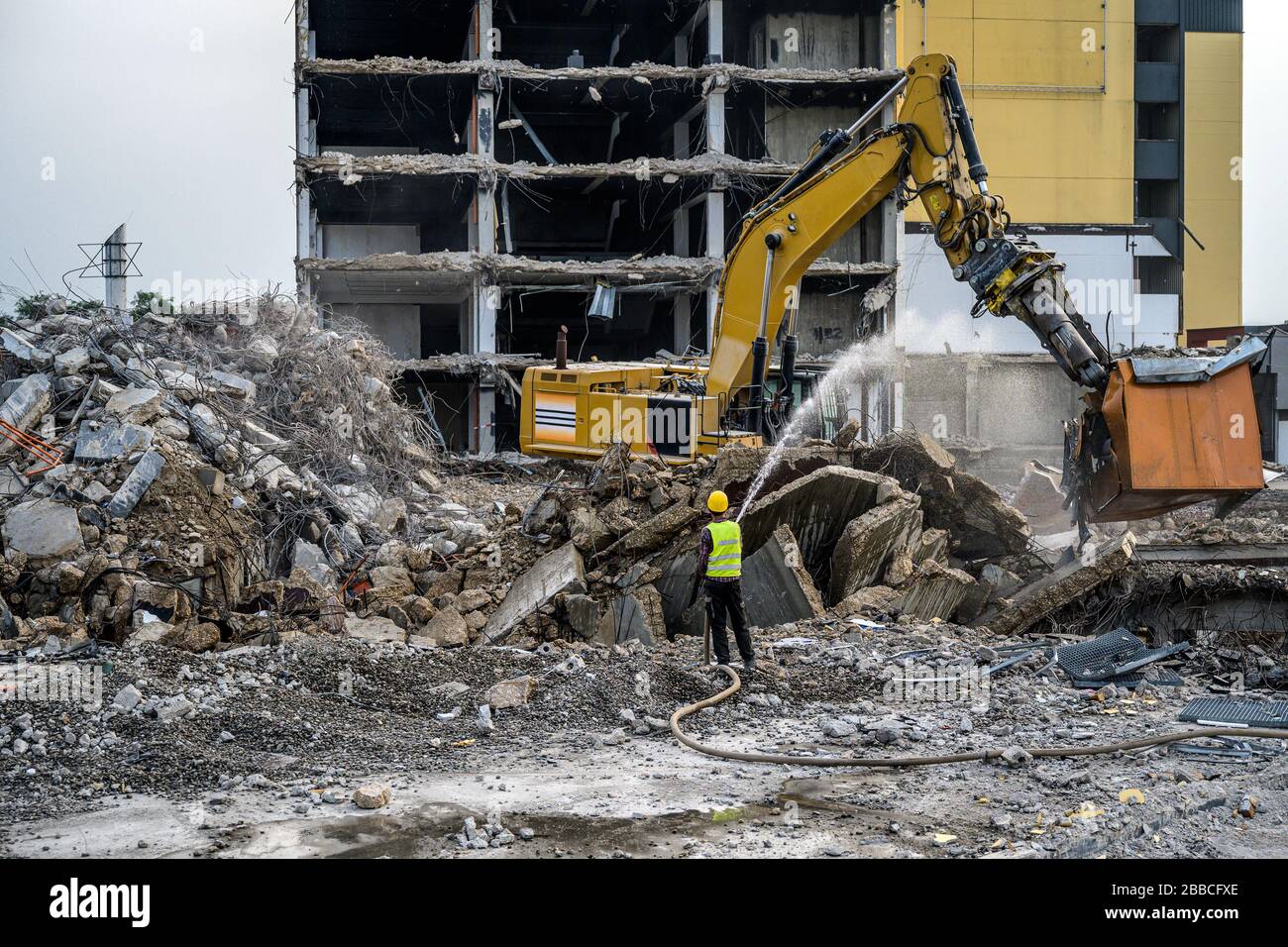Building House destruction Demolition site Excavator with hydraulic ...