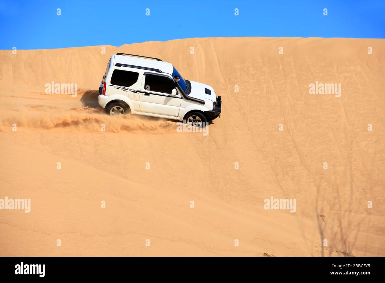 Off-road vehicle traveling in the desert, An suv was driving in the ...