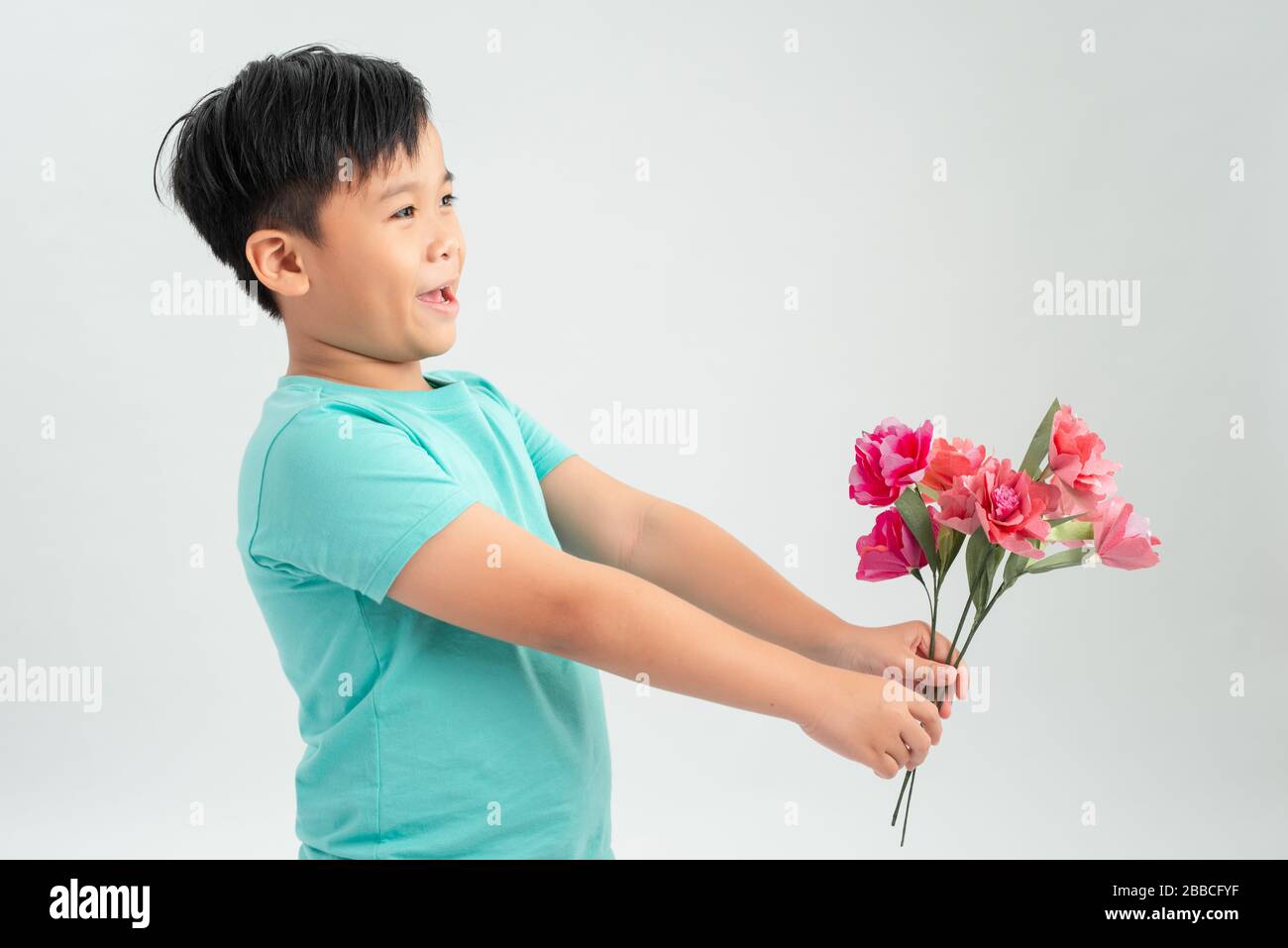 boy with a bouquet of flowers Stock Photo - Alamy