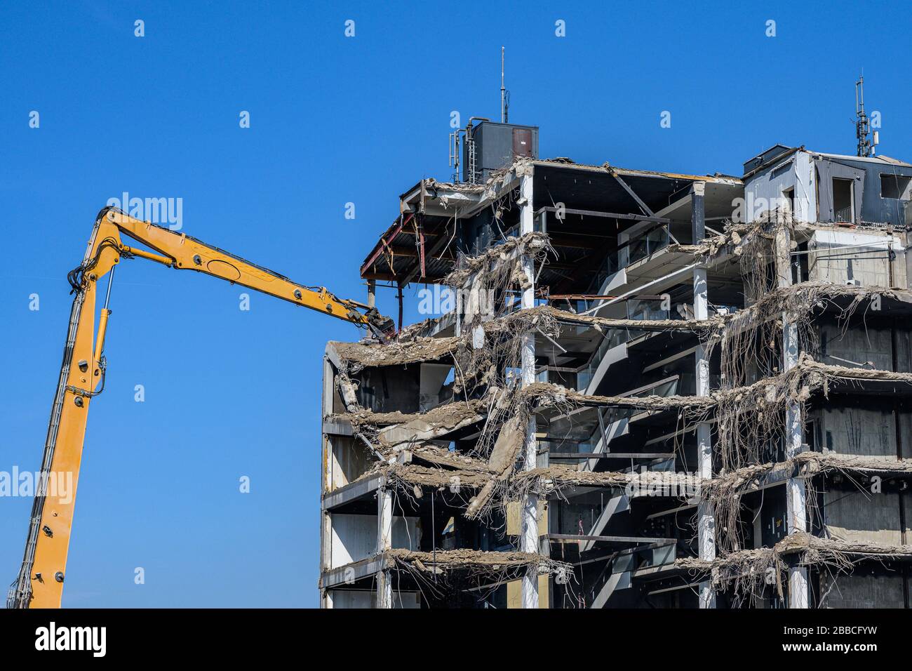 Building House destruction Demolition site Excavator with hydraulic ...