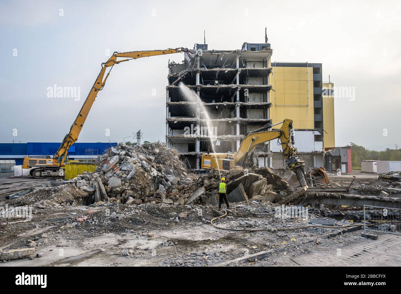 Building House destruction Demolition site Excavator with hydraulic ...