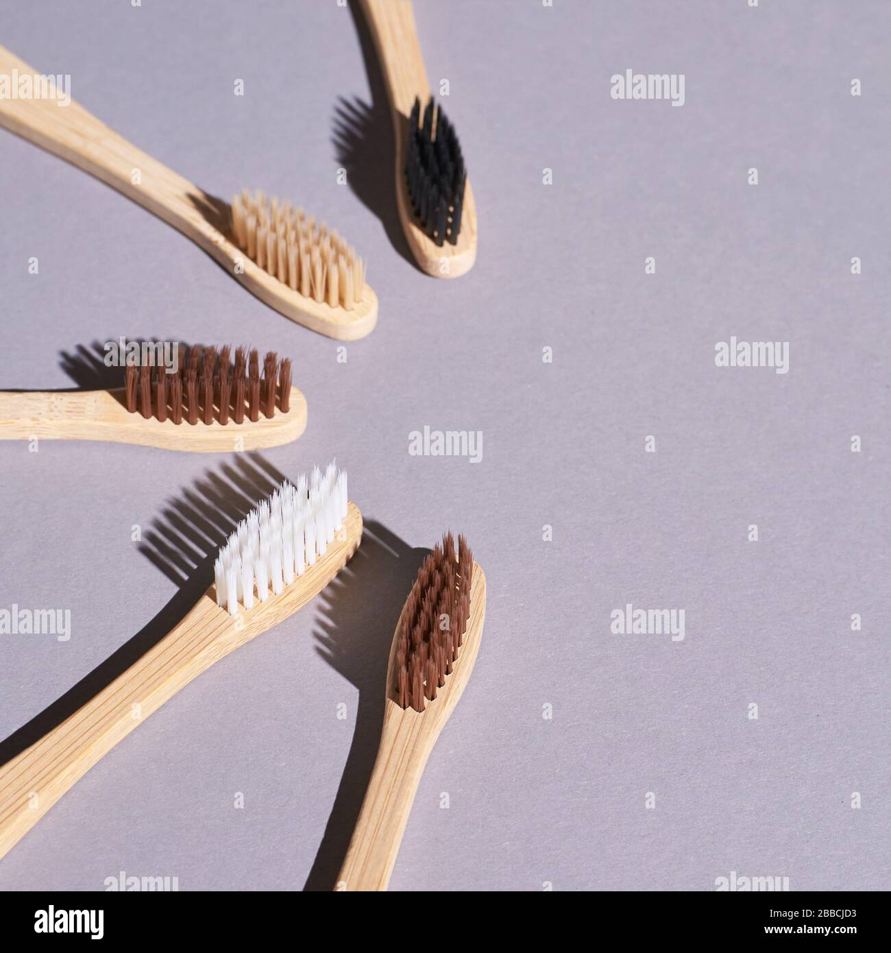 Set of bamboo toothbrushes. Different color Stock Photo - Alamy