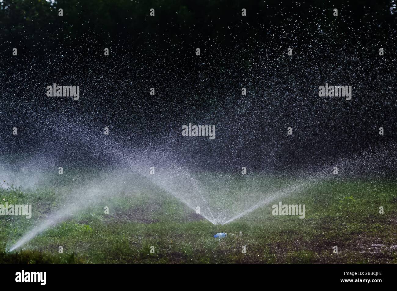 Sprinkle water on outdoor park area Khobar Saudi Arabia Stock Photo - Alamy