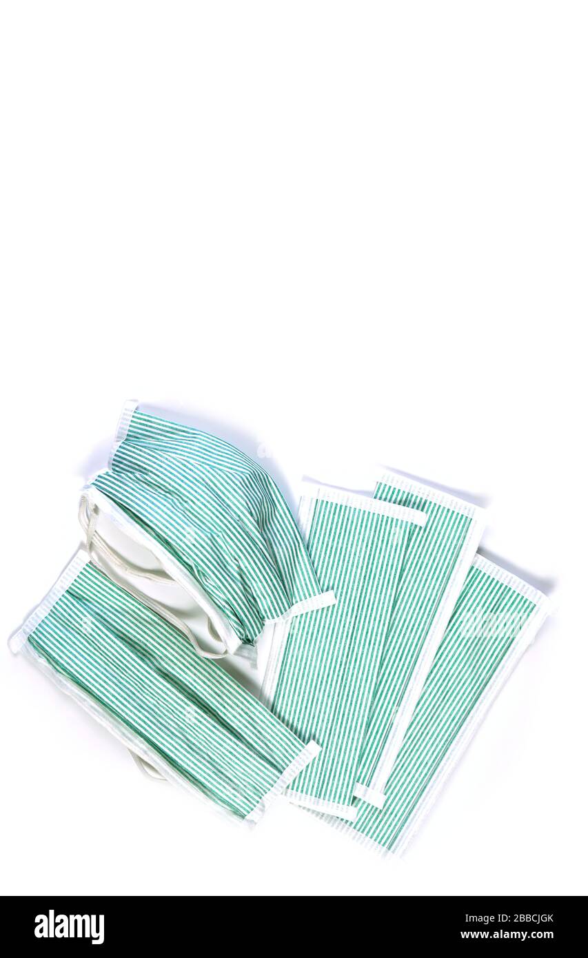 Disposable medical use face masks on white background with negative ...