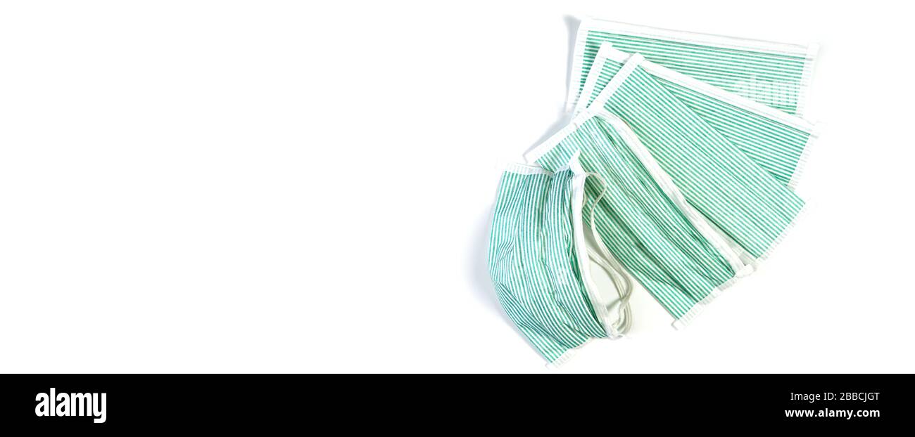 Disposable medical use face masks on white background with negative ...