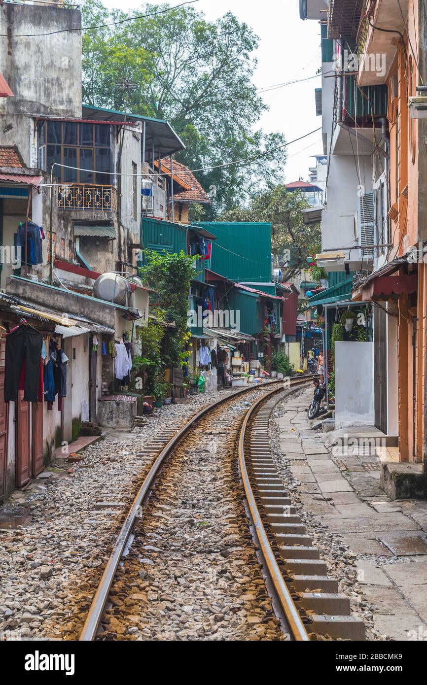 HANOI, VIETNAM - 19TH MARCH 2017: A view along train tracks running ...