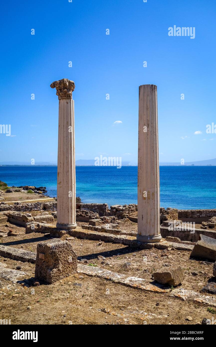 Columns in Tharros archaeological site, Oristano, Sardinia Stock Photo ...
