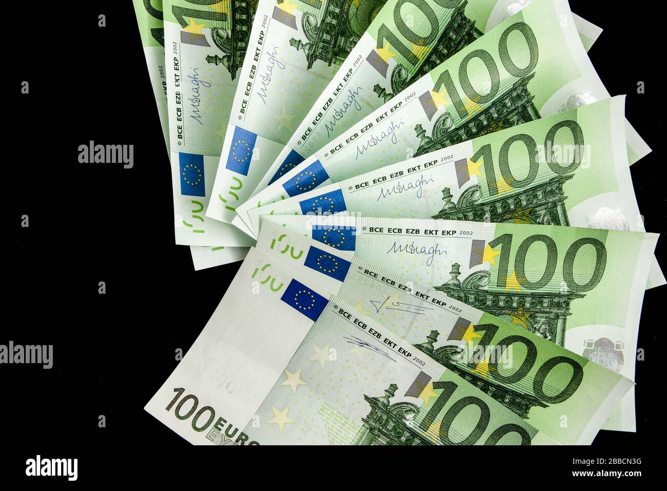 100 Euro - full set of banknotes of euro isolated on black Stock Photo ...