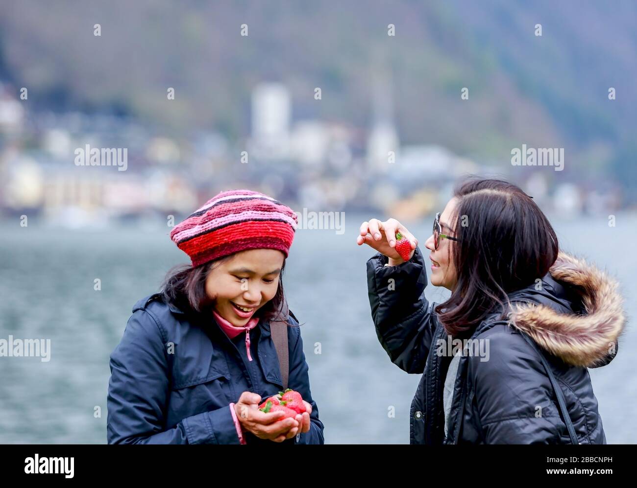 Two friends sharing fruit hi-res stock photography and images - Alamy