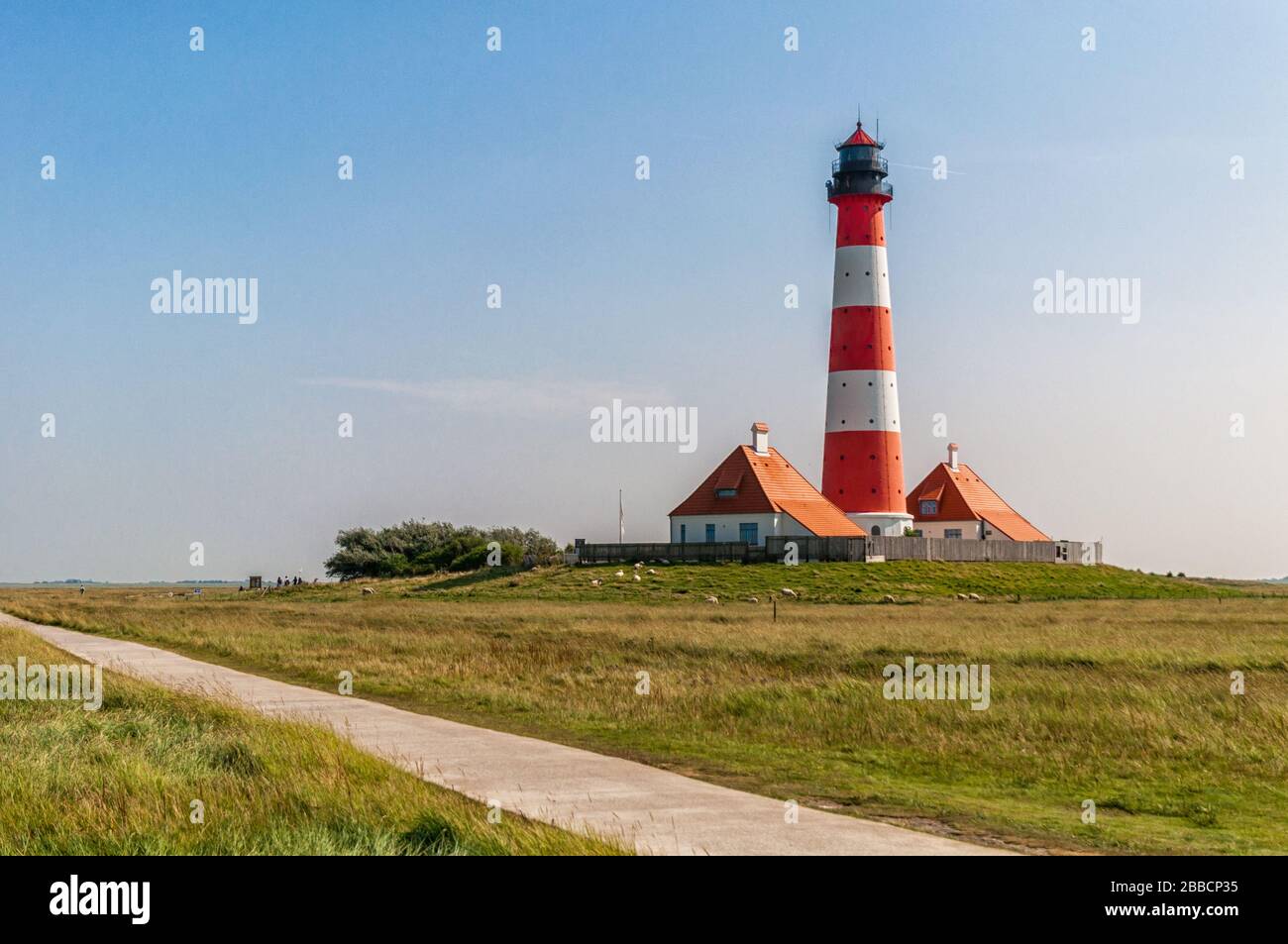 The Westerheversand lighthouse on the North Sea Stock Photo - Alamy