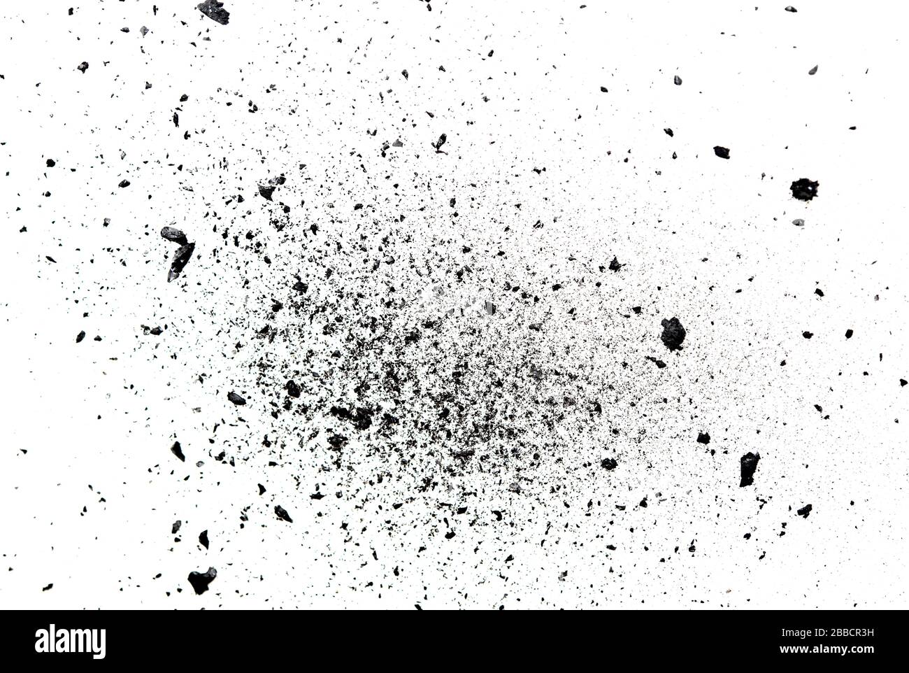 Black coal dust isolated on white background Stock Photo - Alamy