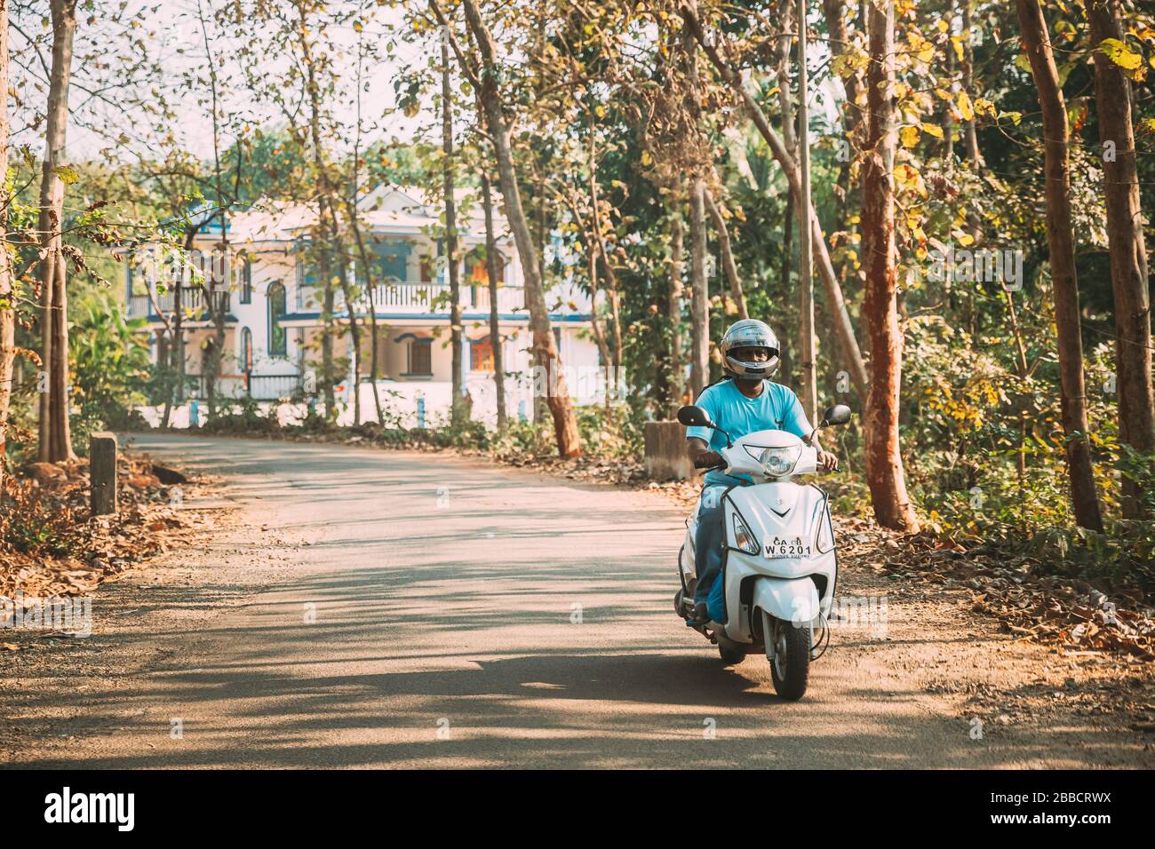 Indian man riding bike hi-res stock photography and images - Alamy