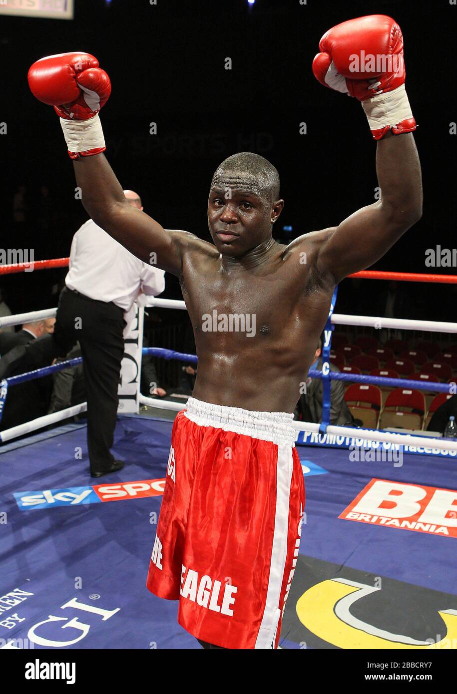 Erick Ochieng (red shorts) defeats Jon Harrison in a Super-Middleweight ...