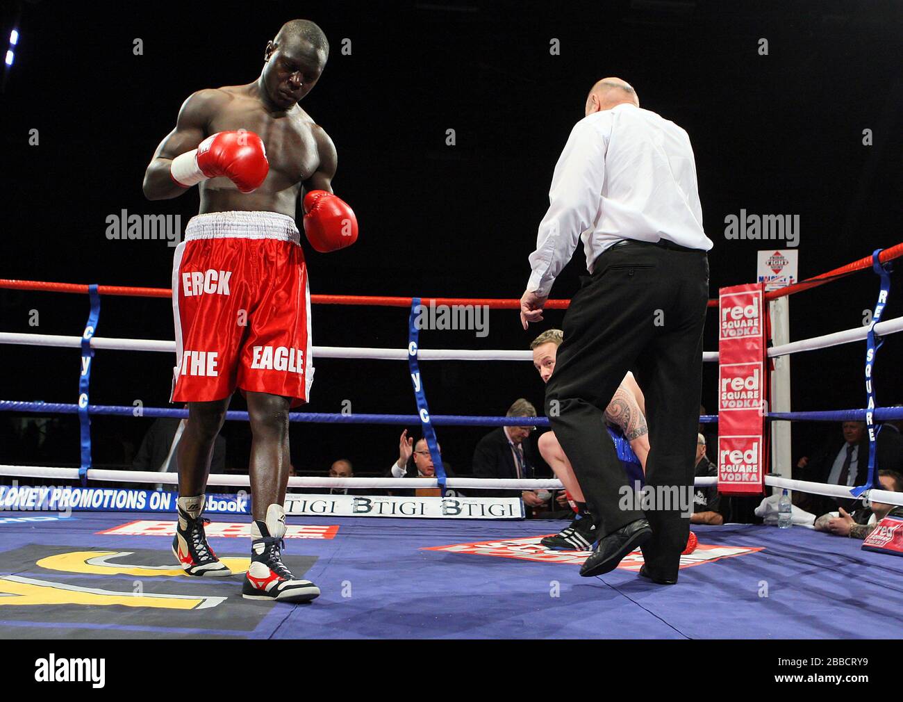 Erick Ochieng (red shorts) defeats Jon Harrison in a Super-Middleweight ...