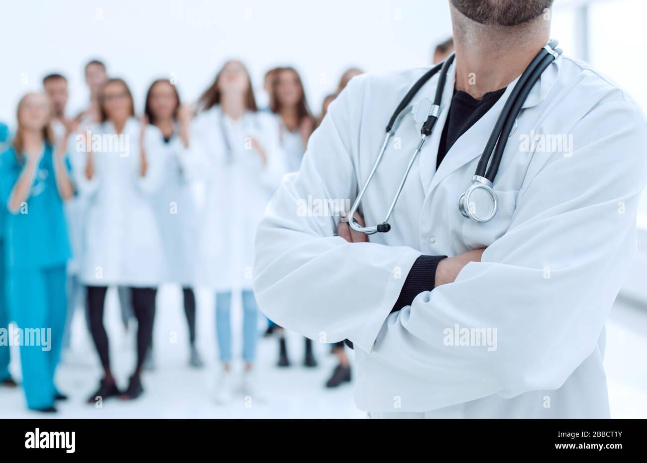 top view. a group of smiling doctors pointing at you Stock Photo - Alamy