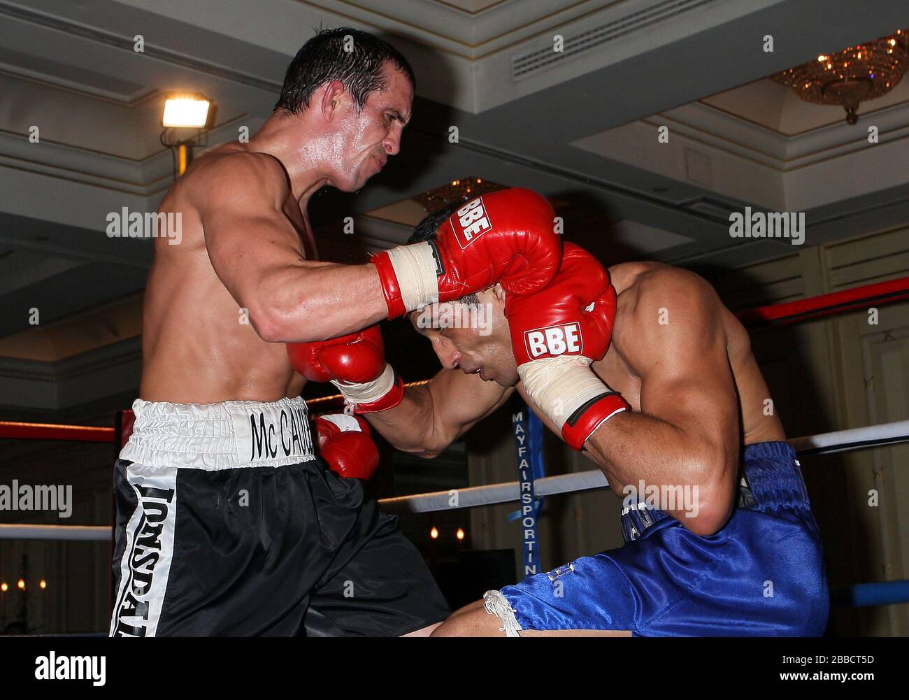 Wayne Alwan-Arab (blue shorts) defeats Kevin McCauley in a Middleweight ...