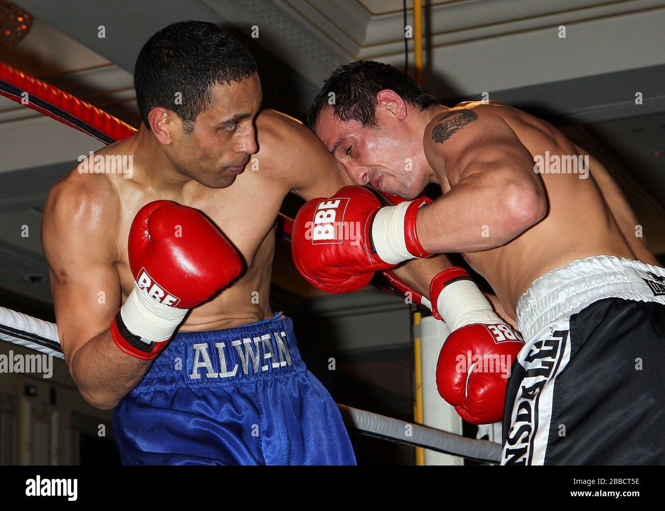 Wayne Alwan-Arab (blue shorts) defeats Kevin McCauley in a Middleweight ...