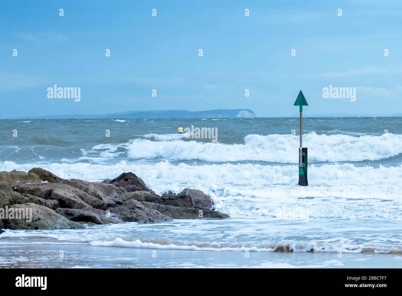 Windy groyne marker post at Bournemouth, Dorset, UK Stock Photo - Alamy