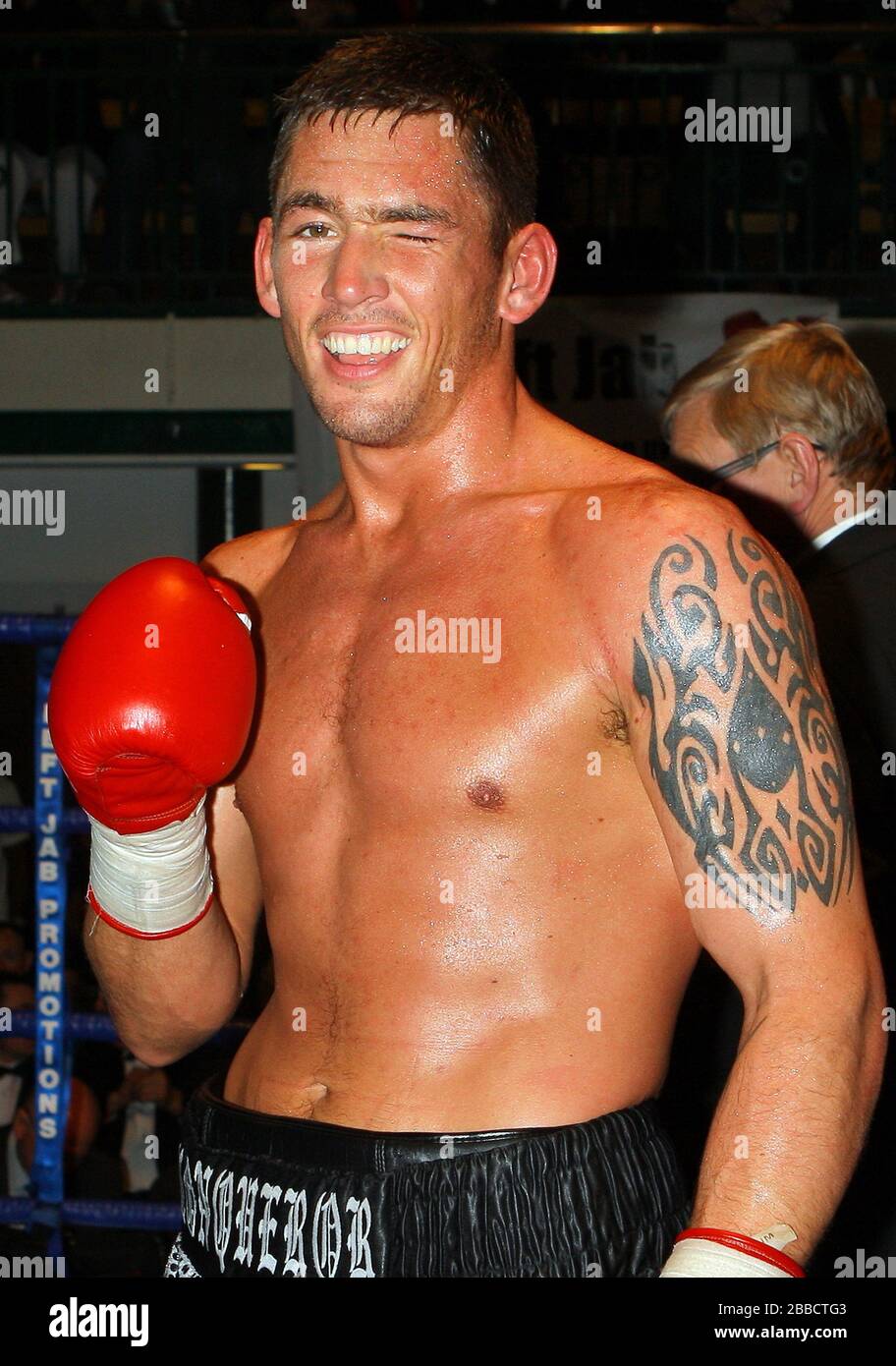 Tony Conquest (silver/black shorts) defeats John Anthony in a ...