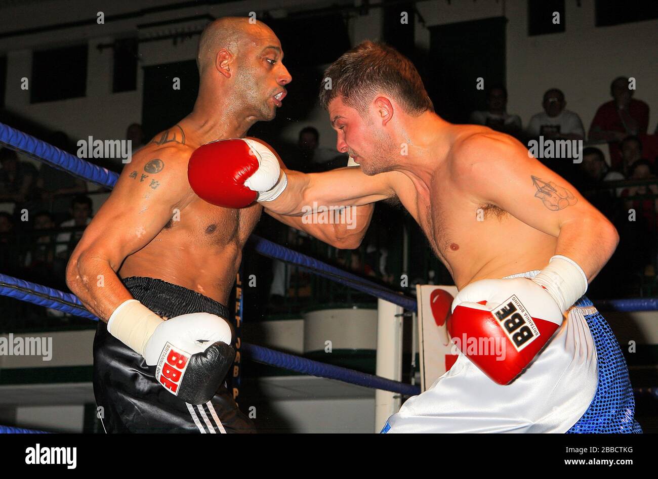 John Wayne Hibbert (blue/white shorts) defeats Rick Boulter in a Light ...