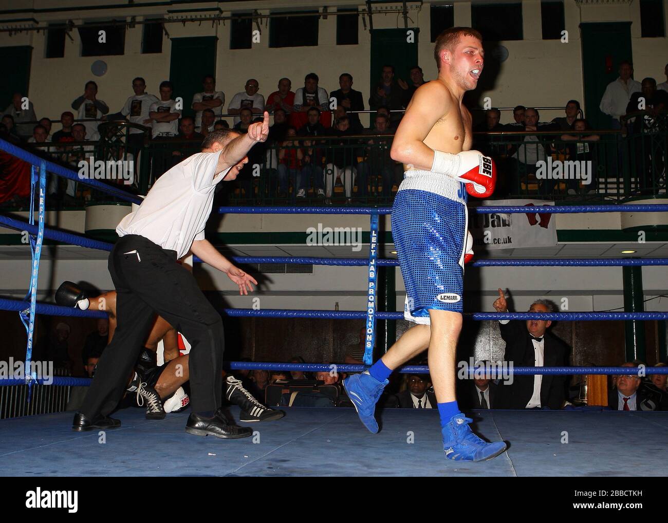 John Wayne Hibbert (blue/white shorts) defeats Rick Boulter in a Light ...