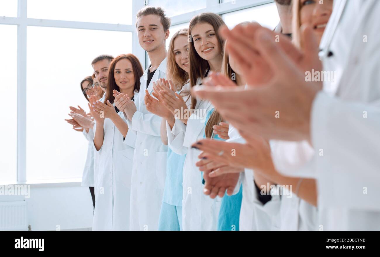 top view. a group of smiling doctors pointing at you Stock Photo - Alamy