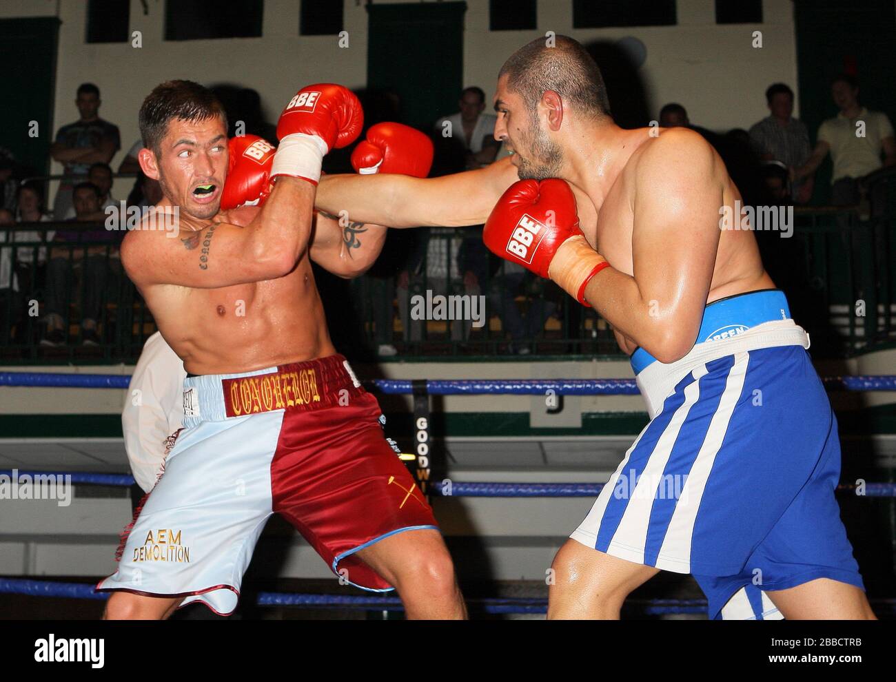 Tony Conquest (claret/blue shorts) defeats Tayar Mehmed in a ...
