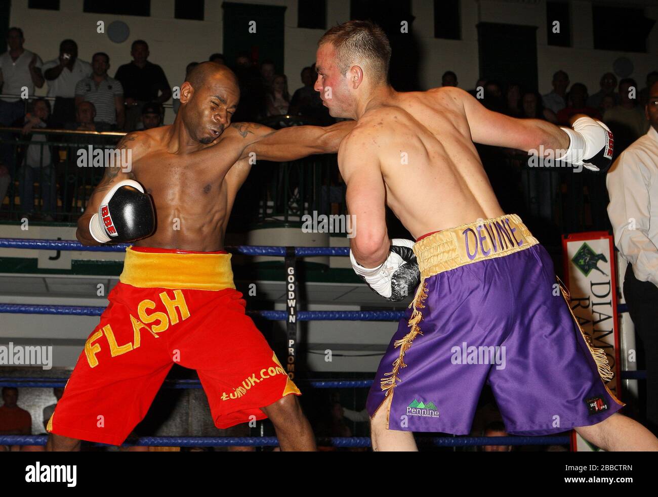 Mark Alexander (red shorts) defeats Michael Devine in a Lightweight ...