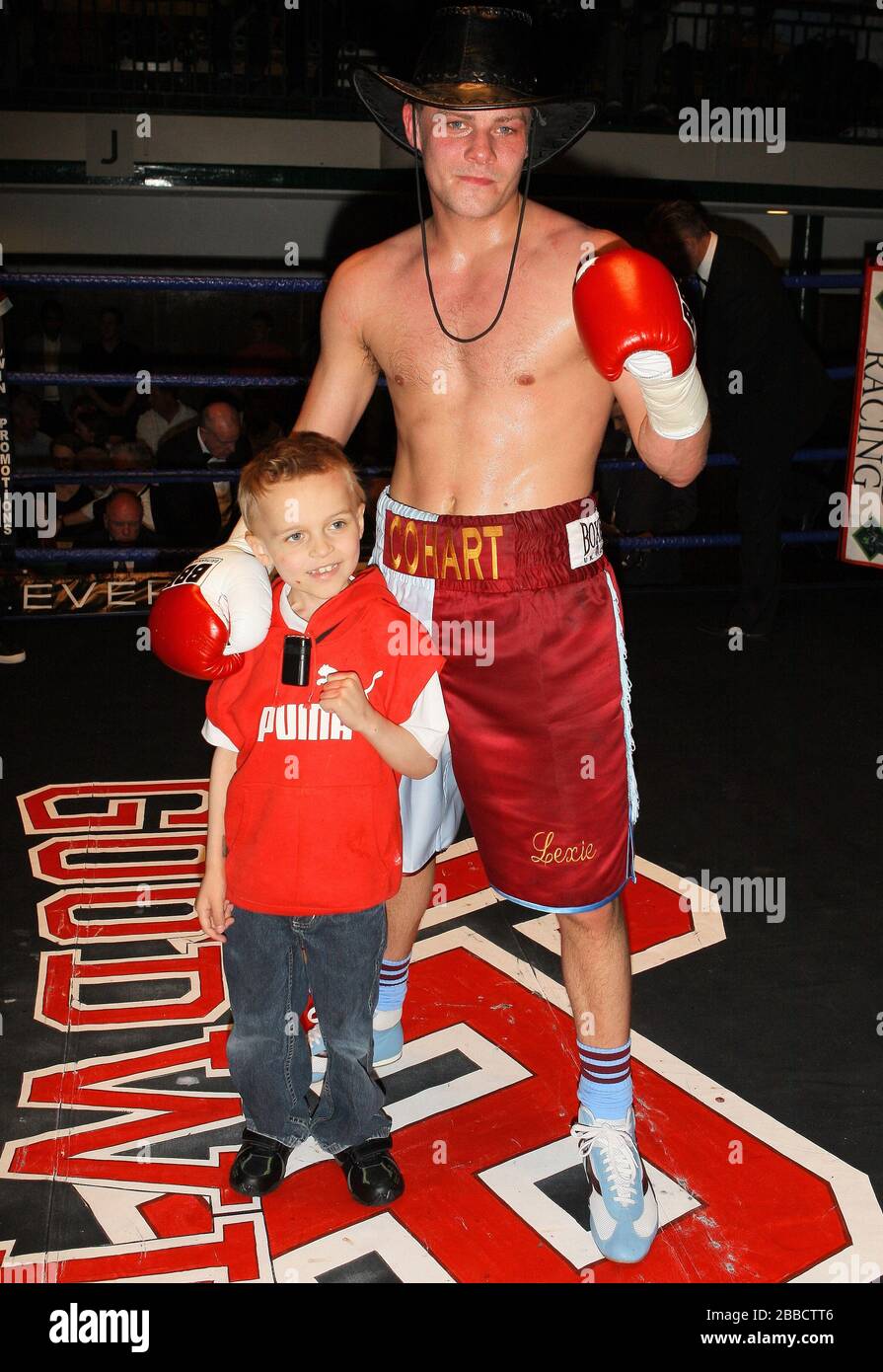 John Wayne Hibbert (claret/blue shorts) defeats Matt Scriven in a ...