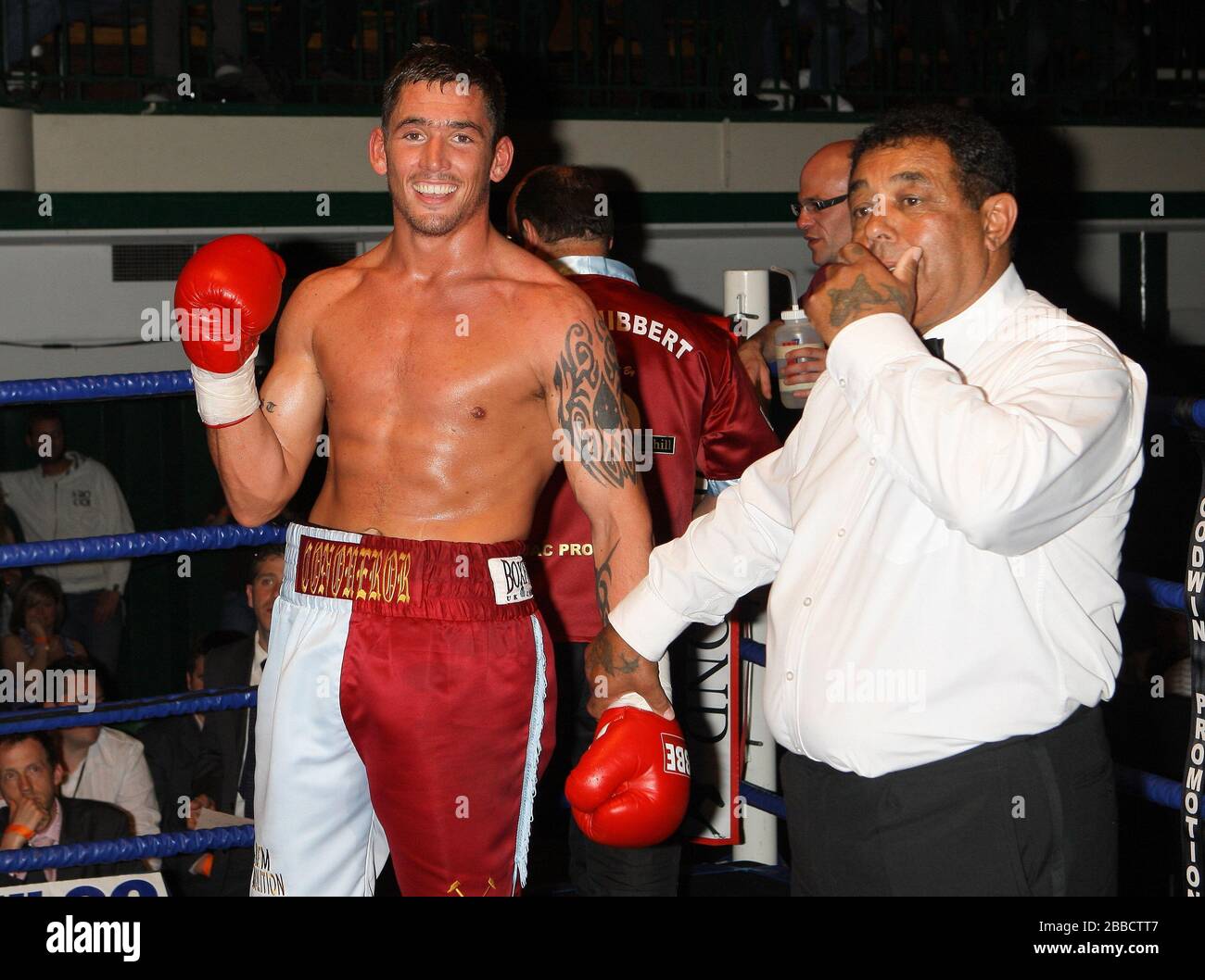 Tony Conquest (claret/blue shorts) defeats Tayar Mehmed in a ...