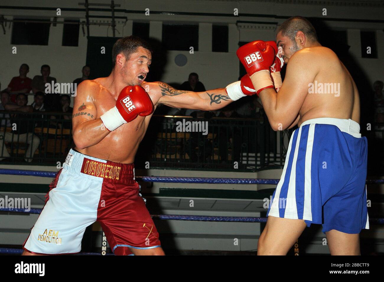 Tony Conquest (claret/blue shorts) defeats Tayar Mehmed in a ...