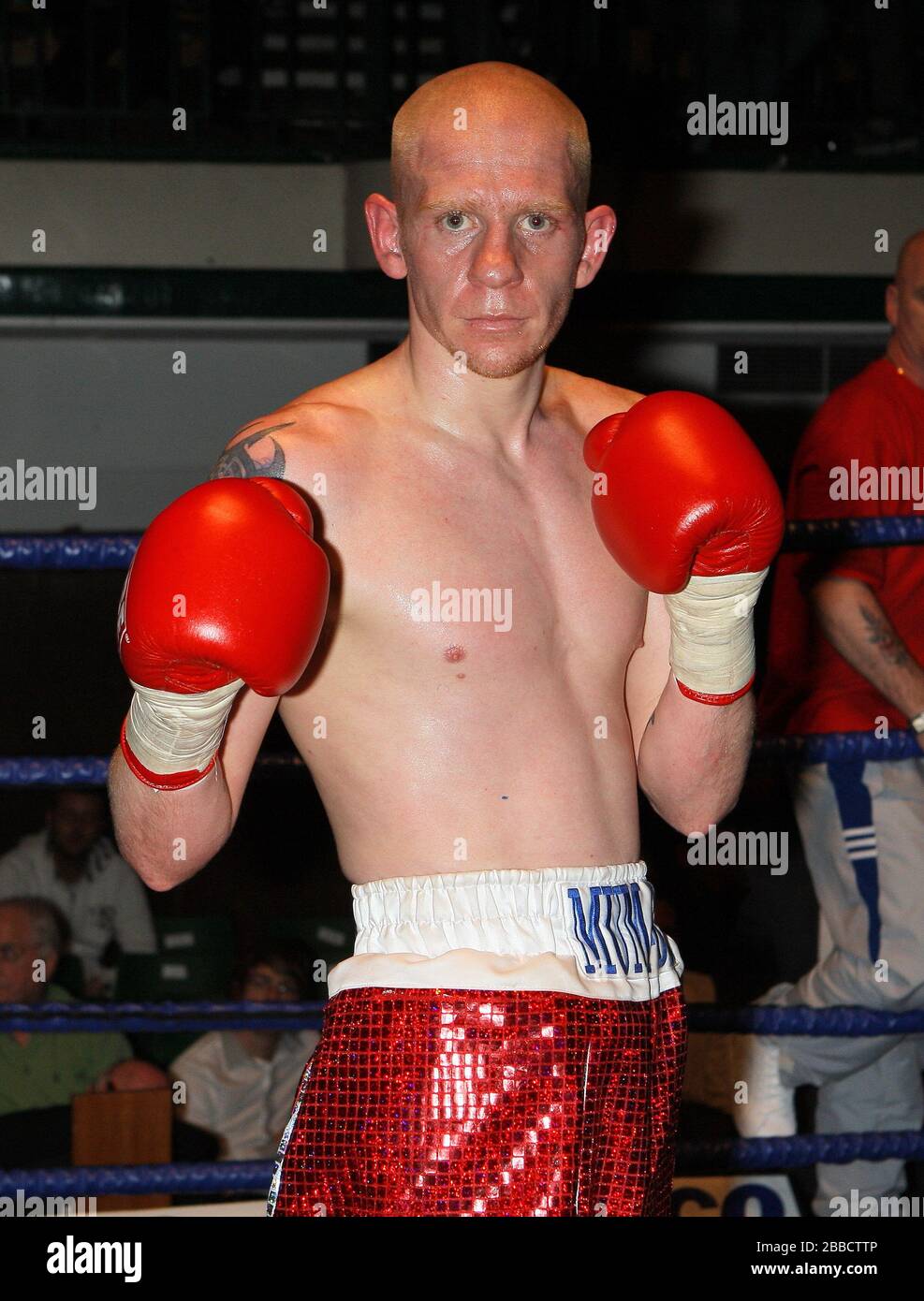 Ryan Barrett (red shorts) defeats Sid Razak in a Lightweight boxing ...
