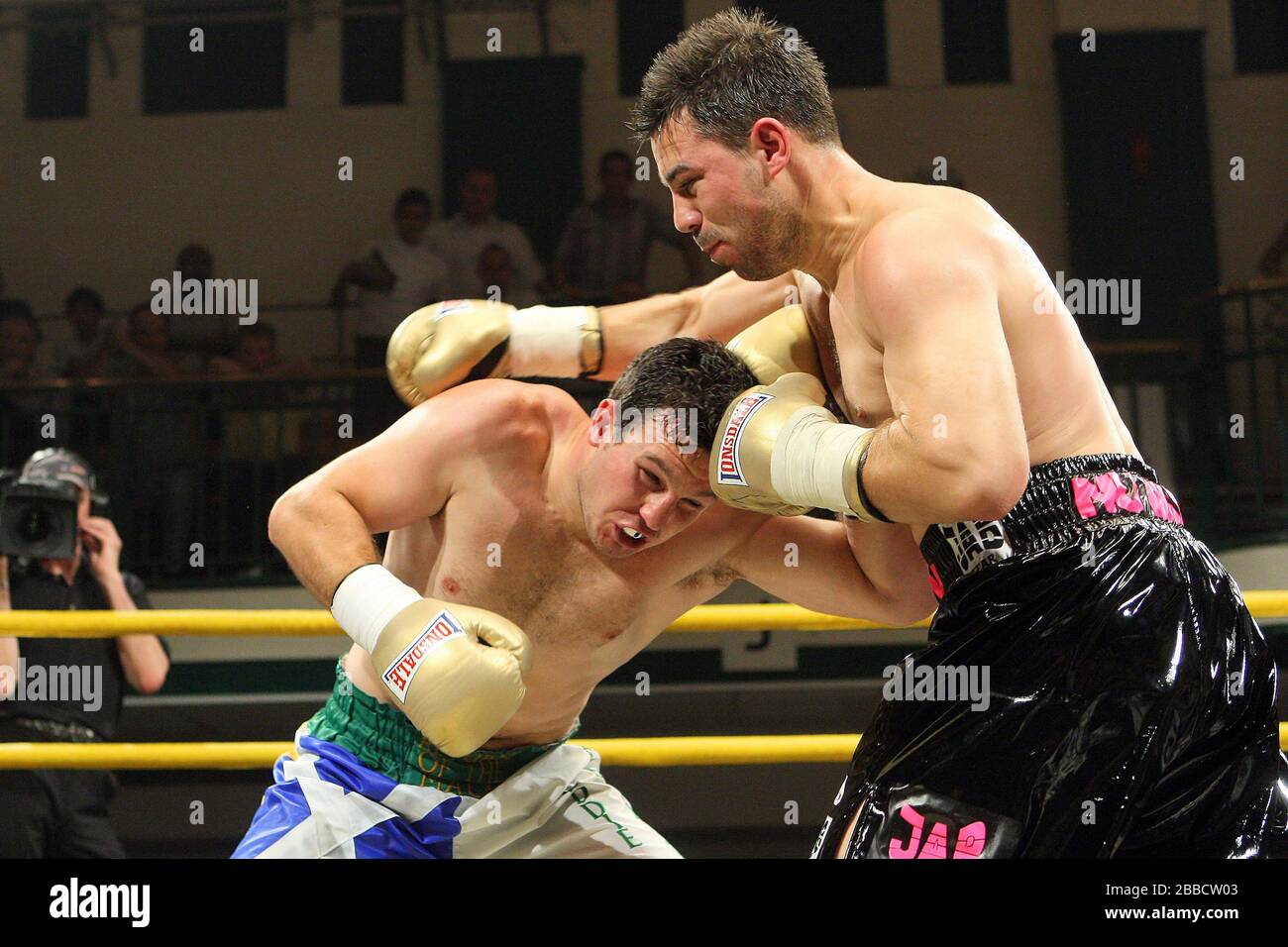 Daniel Cadman (black/pink shorts) defeats Eddie McIntosh in Round One ...