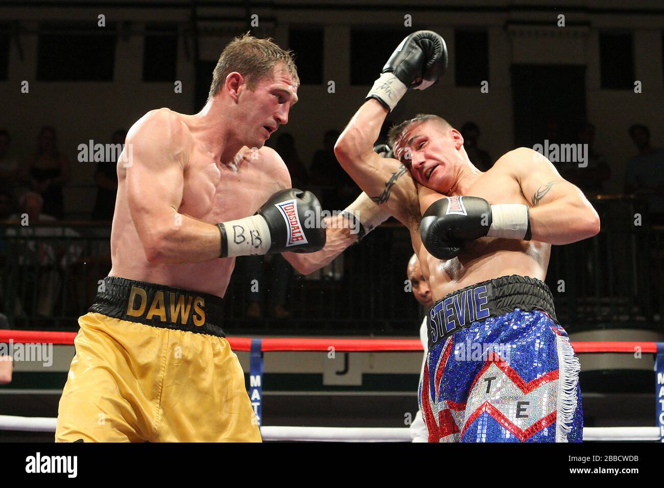 Lenny Daws (gold shorts) defeats Steve Williams in a Light-Welterweight ...