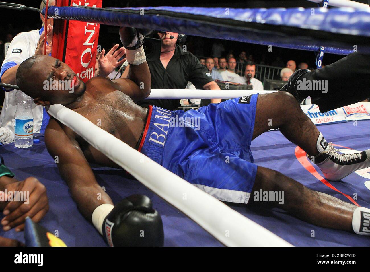 Bradley Pryce (white shorts) defeats Ted Bami in a Welterweight boxing ...