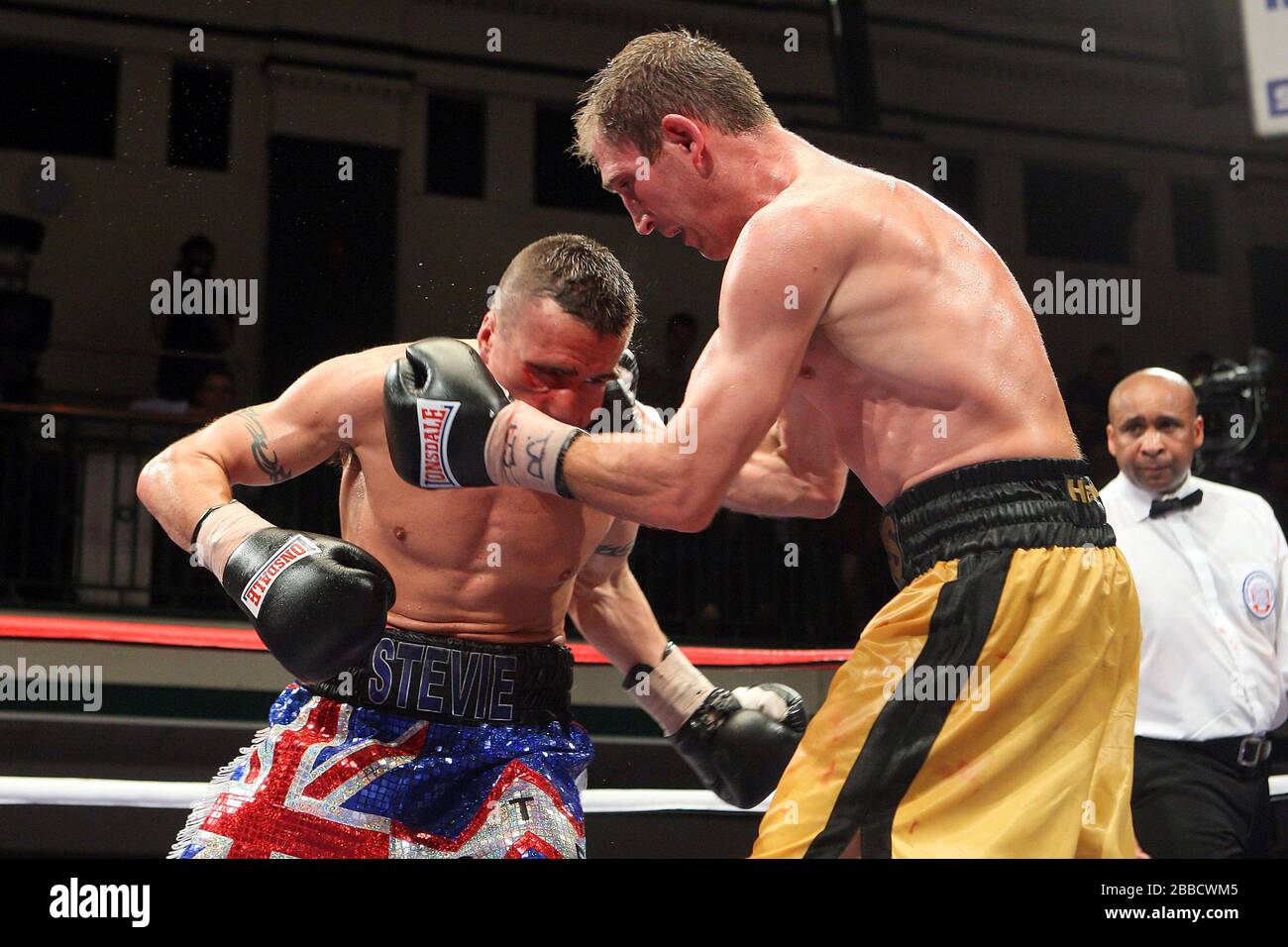 Lenny Daws (gold shorts) defeats Steve Williams in a Light-Welterweight ...