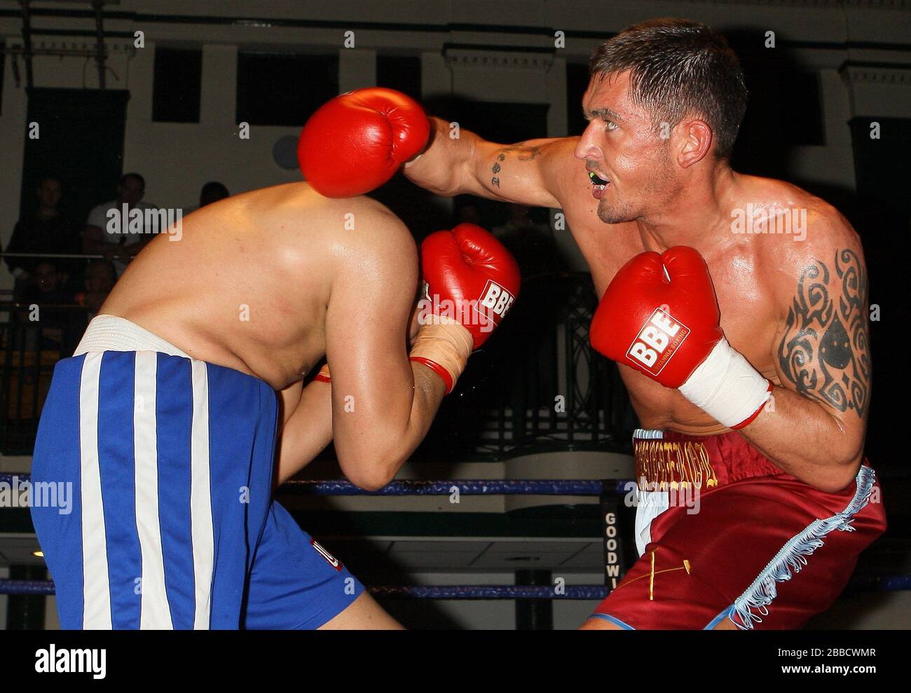 Tony Conquest (claret/blue shorts) defeats Tayar Mehmed in a ...