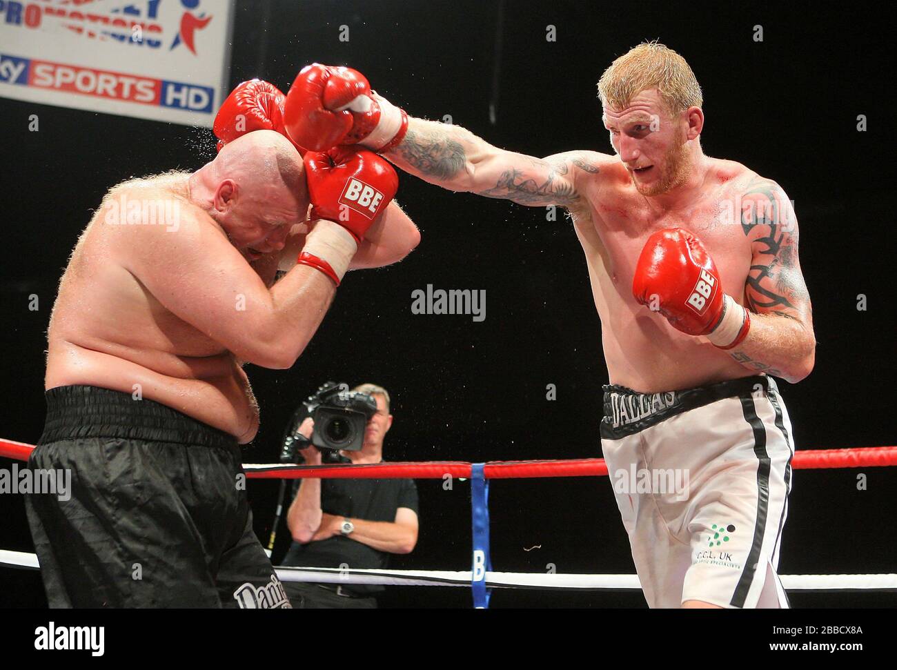 Tom Dallas (white shorts) defeats Daniil Peretyatko in a Heavyweight ...