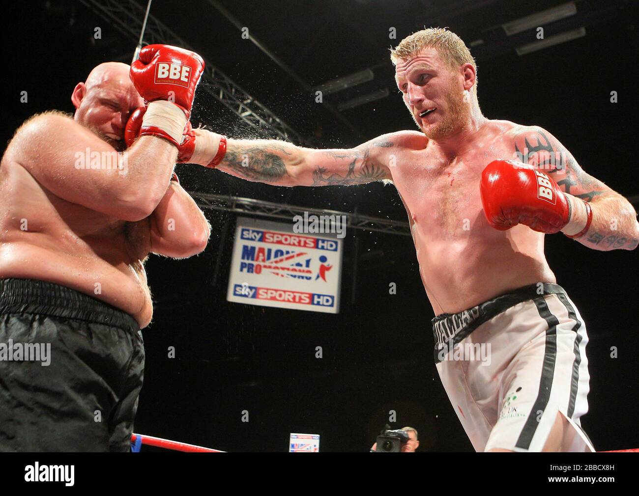 Tom Dallas (white shorts) defeats Daniil Peretyatko in a Heavyweight ...