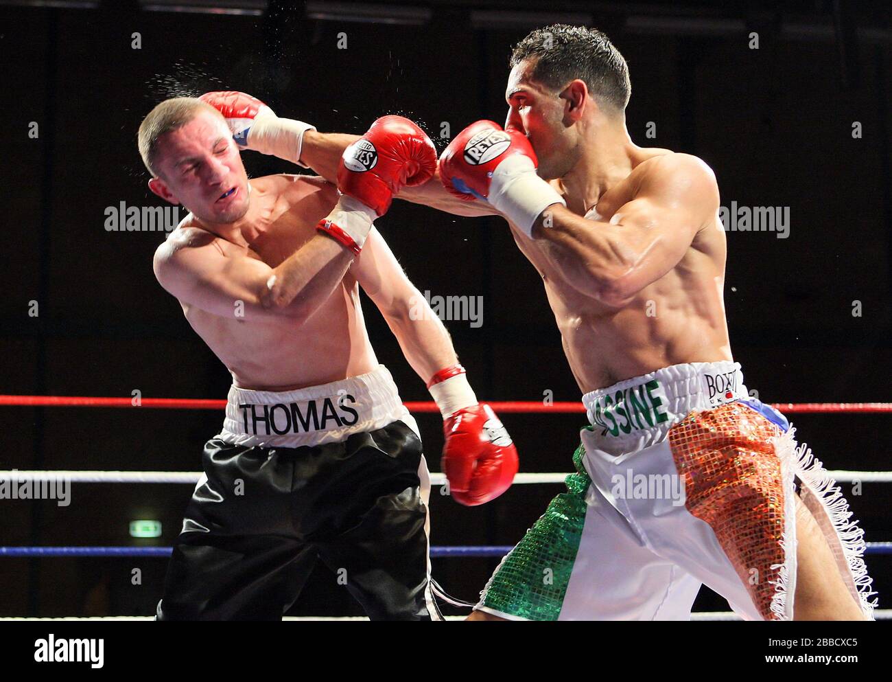 Yassine El Maachi (white/gold/green shorts) defeats Thomas Grublys in a ...