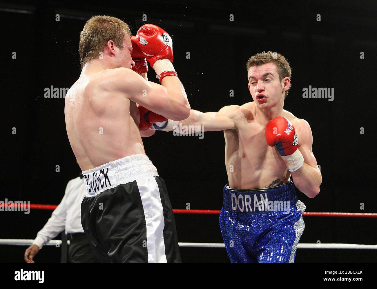 Tom Doran (blue shorts) defeats Janis Chernouskis in a Light ...