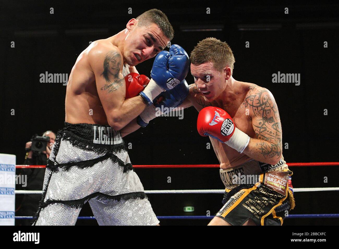 Pat McAleese (gold/black shorts) draws with Lee Noble in a Light ...