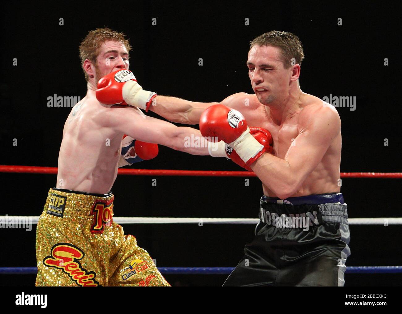 Joe Murray (gold shorts) defeats Yuri Voronin in a Super-Bantamweight ...