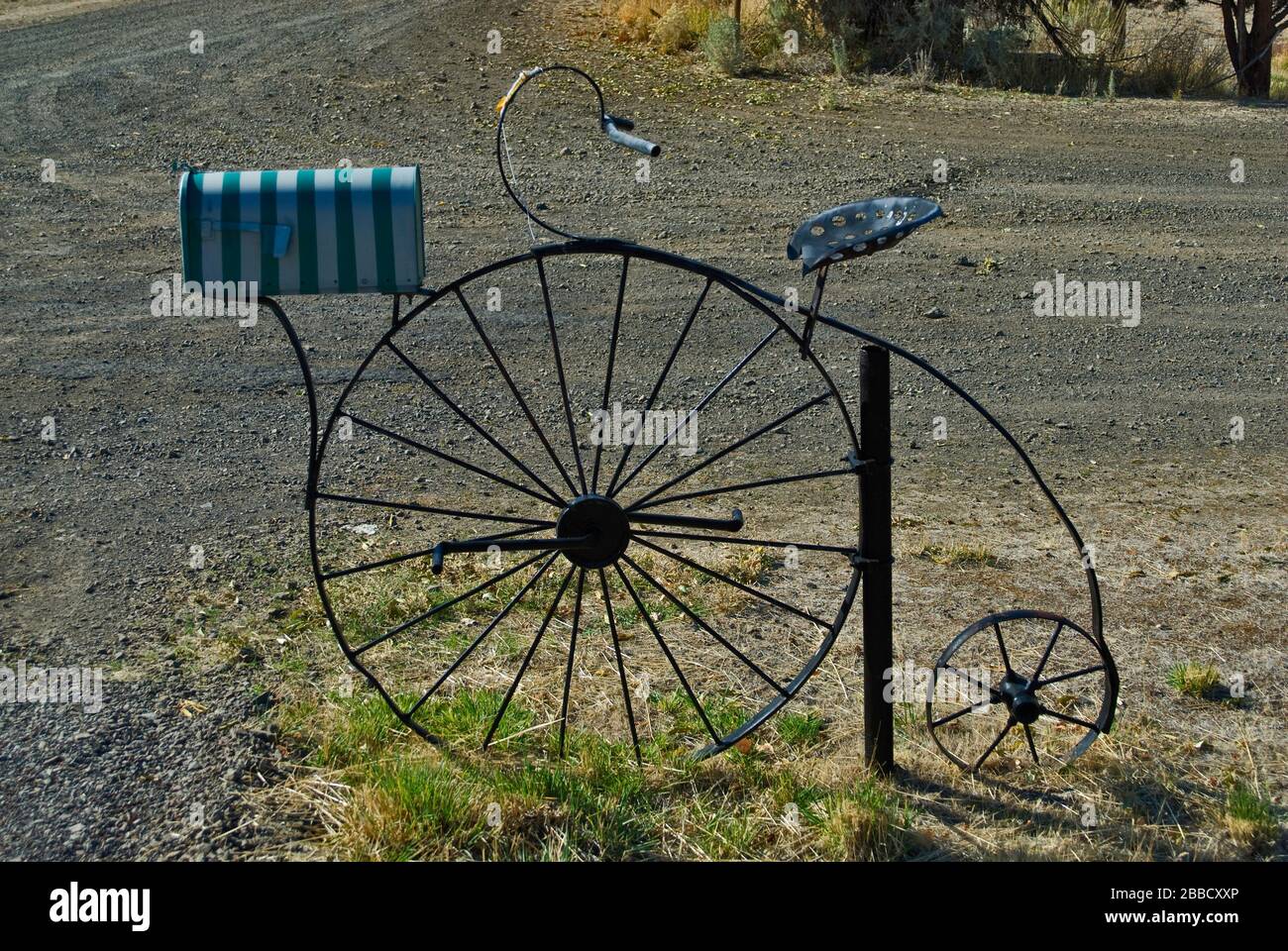 Mailbox placed on velocipede-like post at house on Bakeoven Rd near ...
