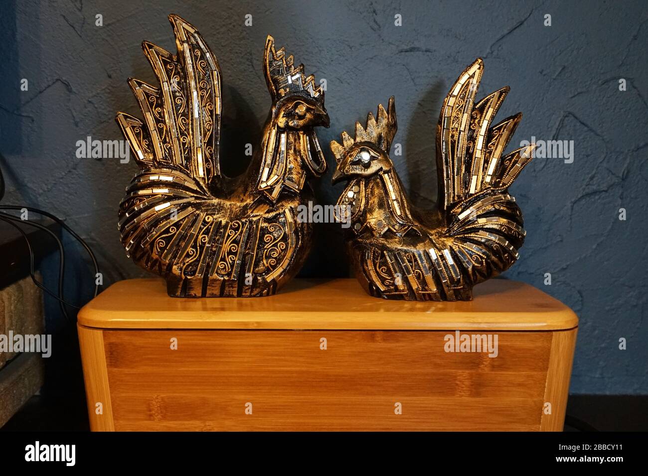 Chicken shaped house furnishing made of wood and mirror decorated on ...