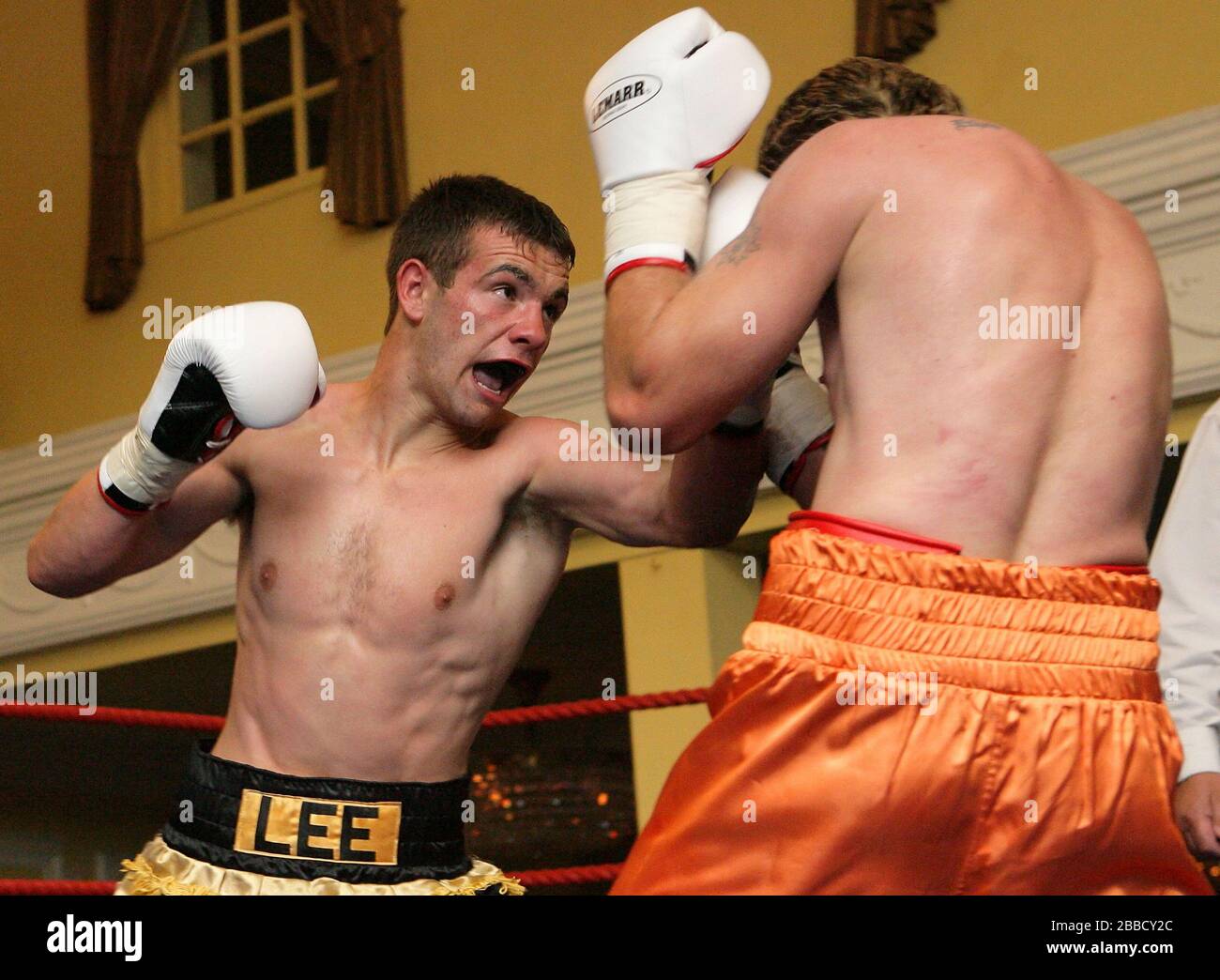 Duncan Cottier (orange shorts, Chingford) fights Lee Purdy (Colchester ...
